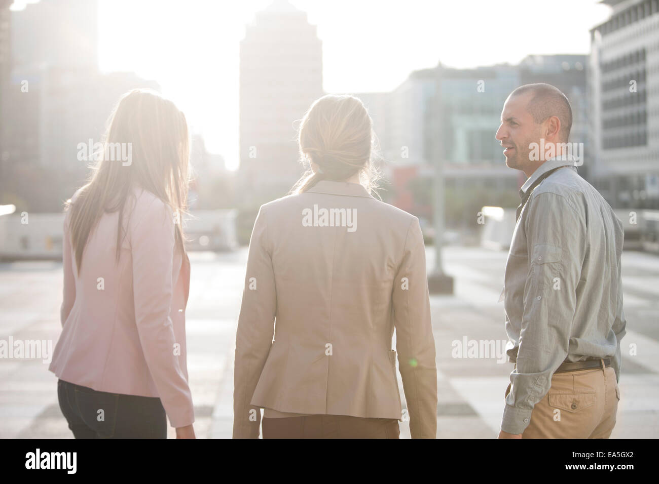 Three colleagues spending break time together Stock Photo - Alamy