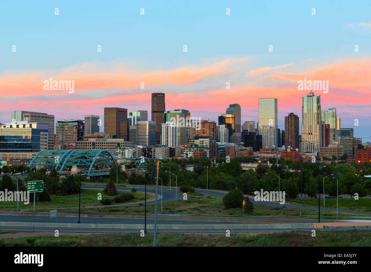 USA, Colorado, Denver, Cityscape with Interstate Highway at sunet Stock ...