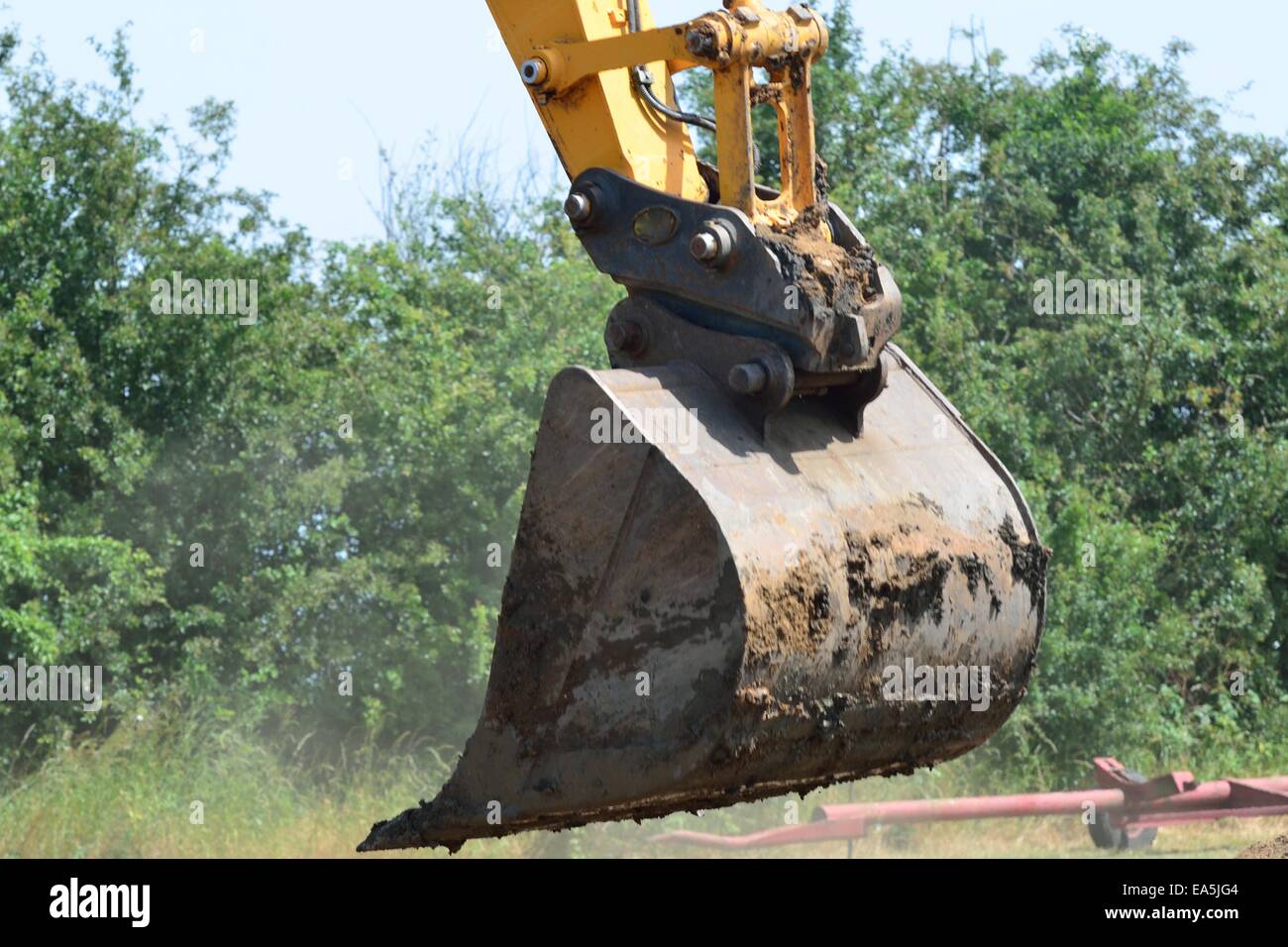 Yellow mechanical shovel hi-res stock photography and images - Alamy