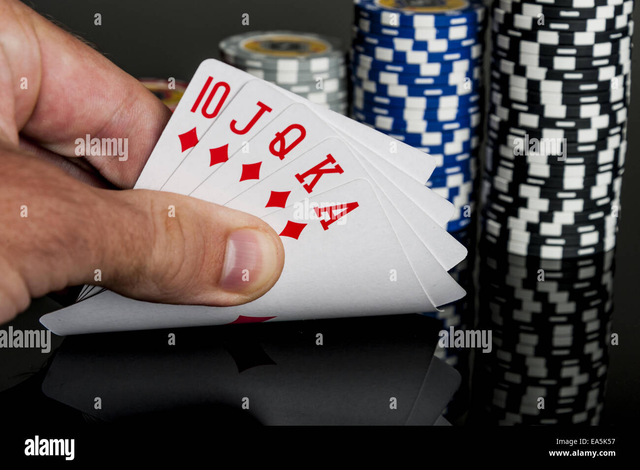 Poker chips Playing cards Stock Photo - Alamy