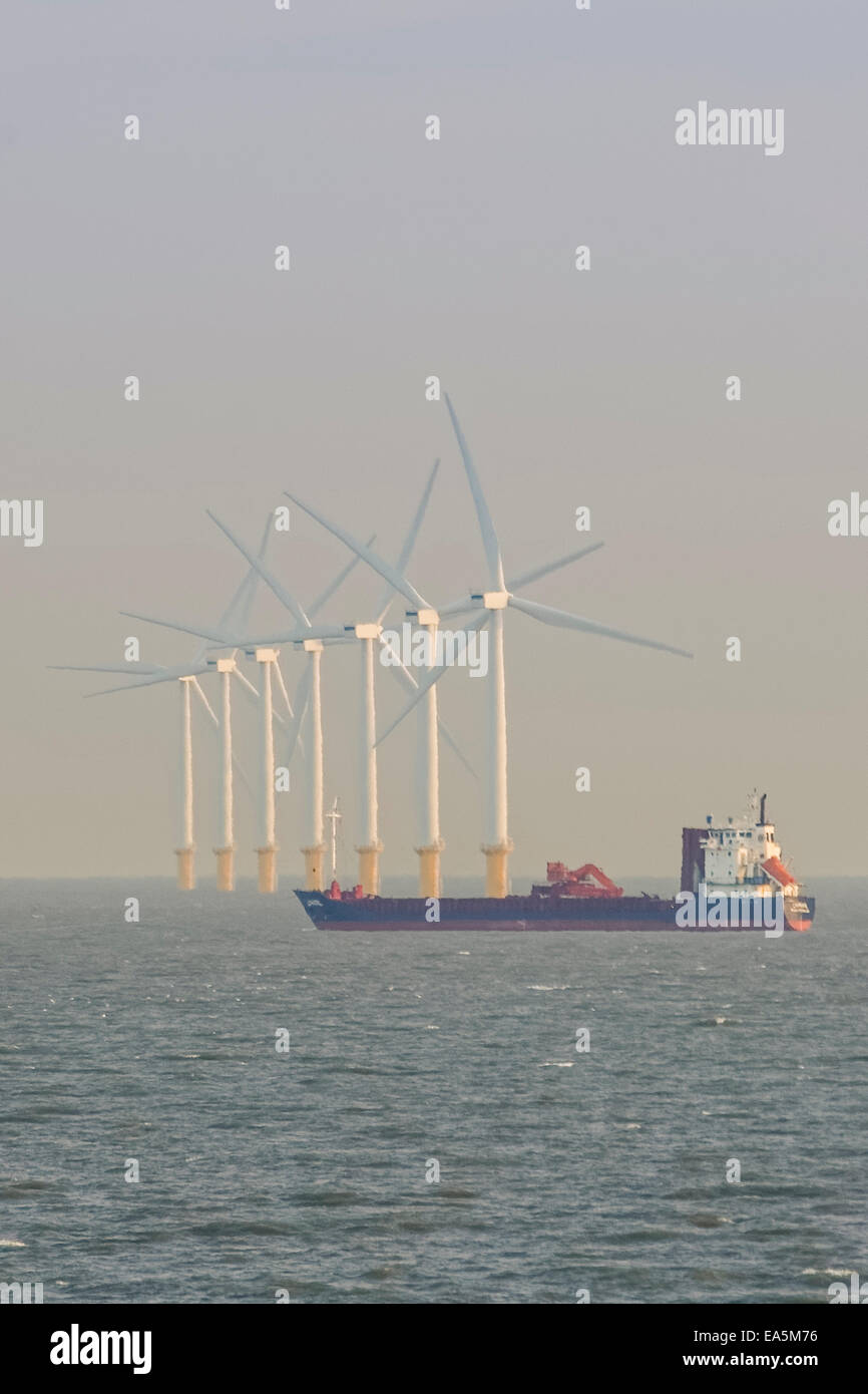 Offshore wind farm turbines and barge in sea near Clacton-on-Sea, Essex ...
