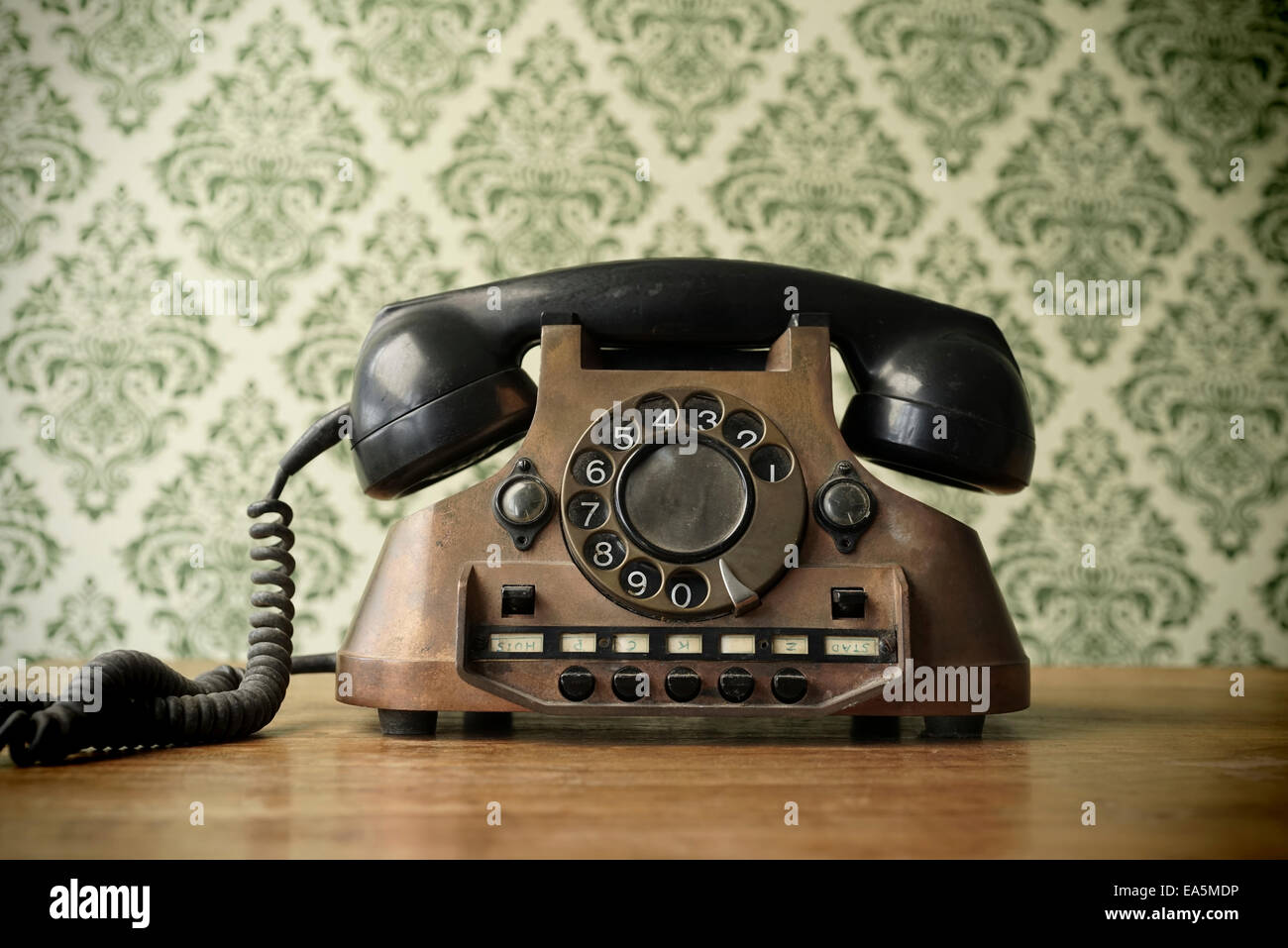 Old telephone made of copper Stock Photo - Alamy