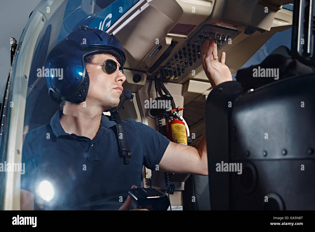 Germany, Bavaria, Landshut, Helicopter pilot in cockpit Stock Photo - Alamy