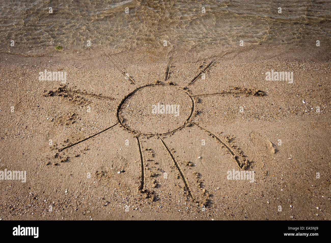sun on sand beach Stock Photo - Alamy