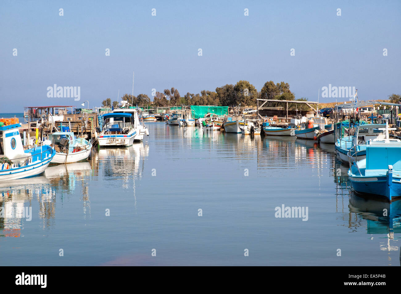Small cute fishing boats in the harbour Stock Photo - Alamy
