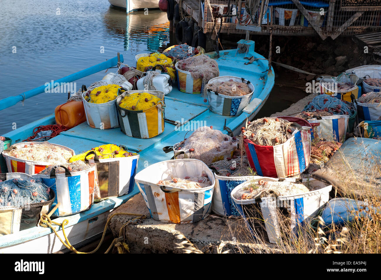 Small cute fishing boats in the harbour Stock Photo - Alamy