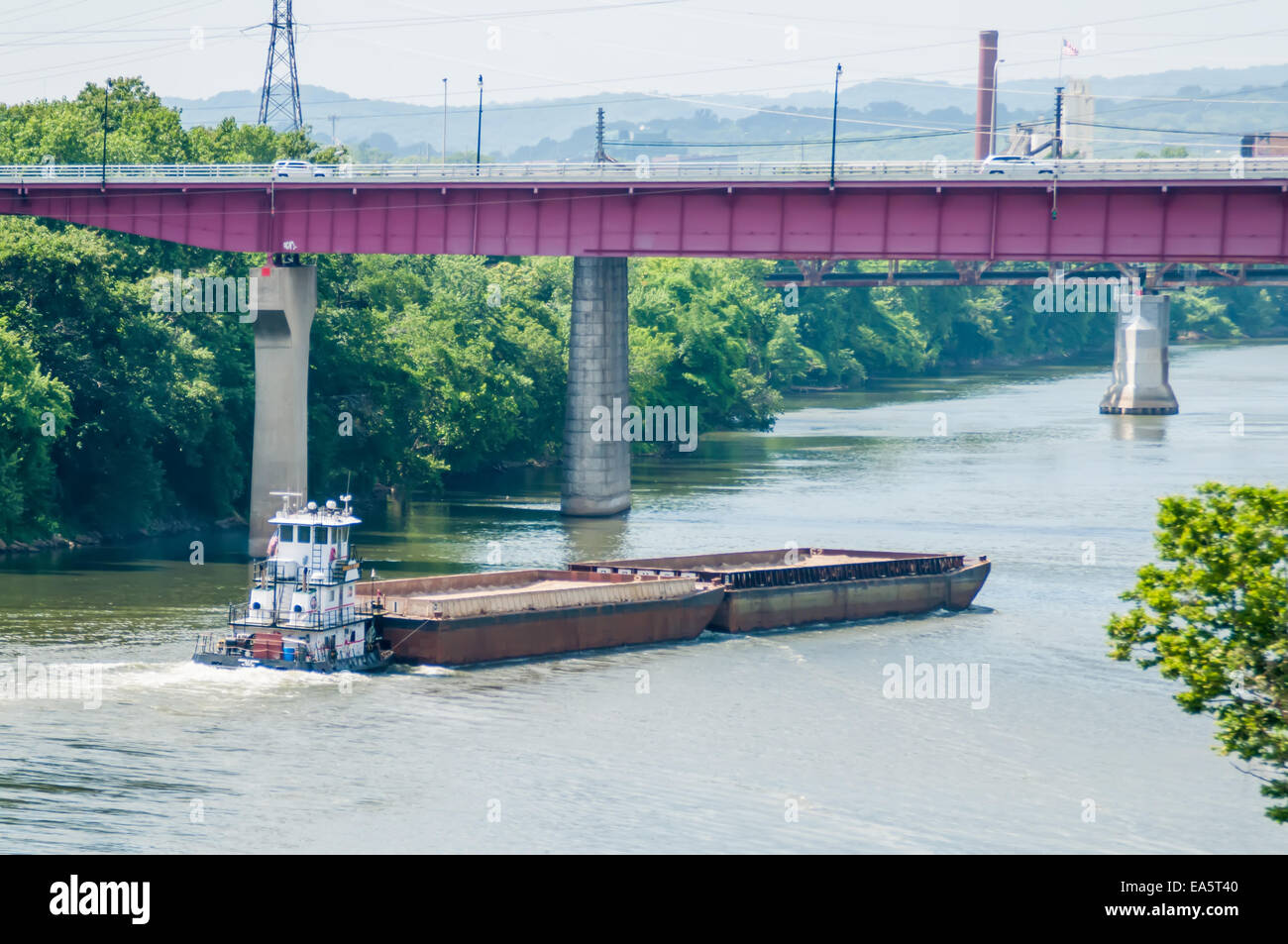 Barge ship moving on water towards bridge hi-res stock photography and ...