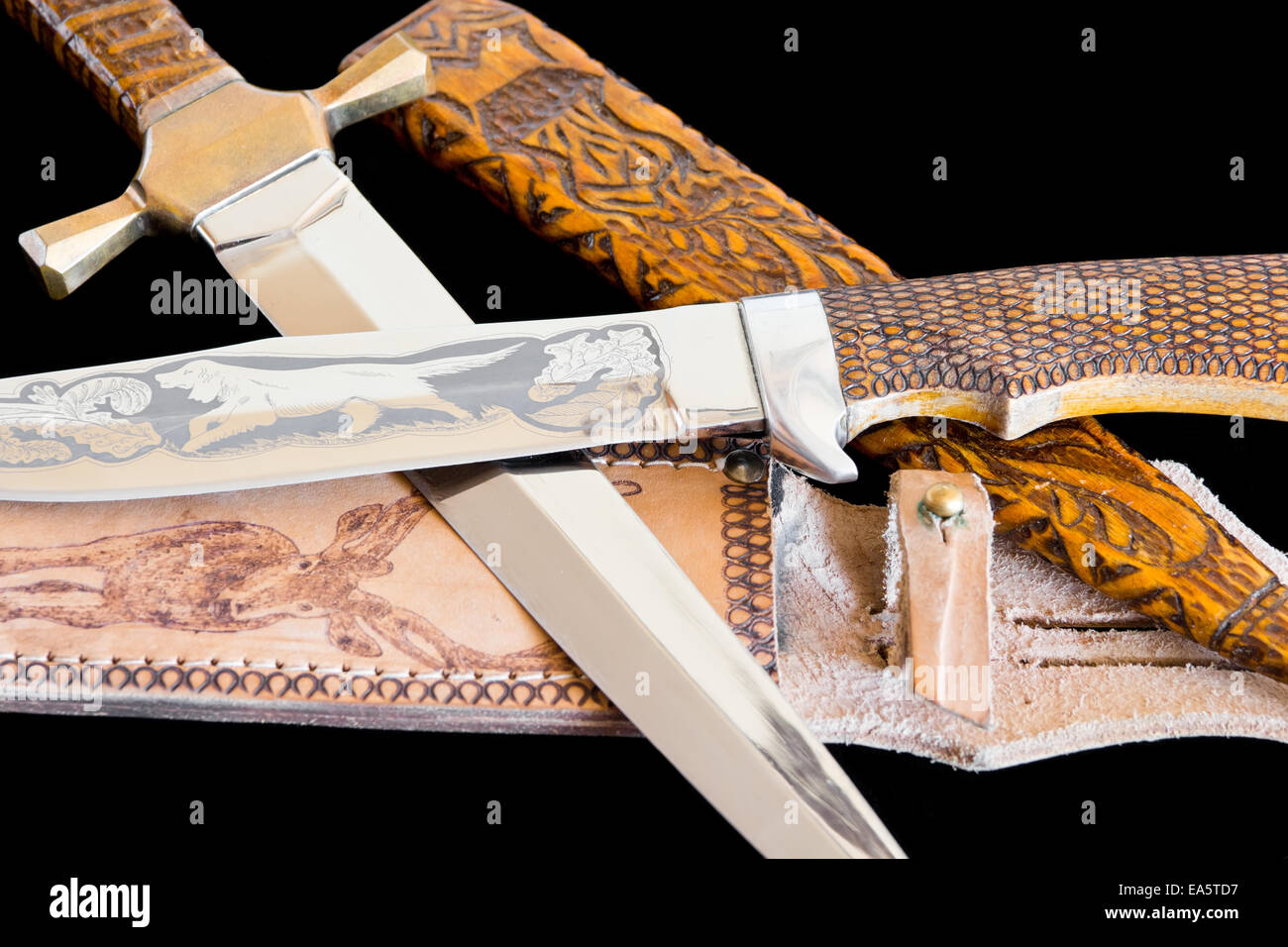 Cold weapon on black background Stock Photo - Alamy