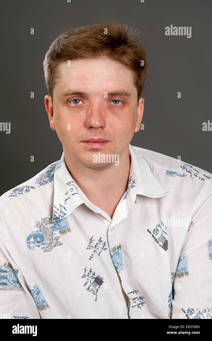 man posing in white shirt Stock Photo - Alamy