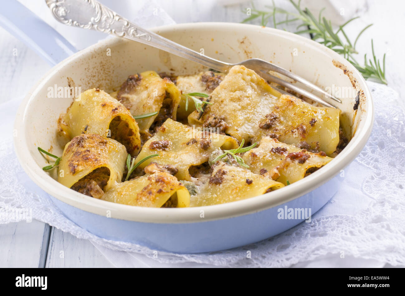 italian pasta Mezzi Paccheri filled with minced meat Stock Photo - Alamy