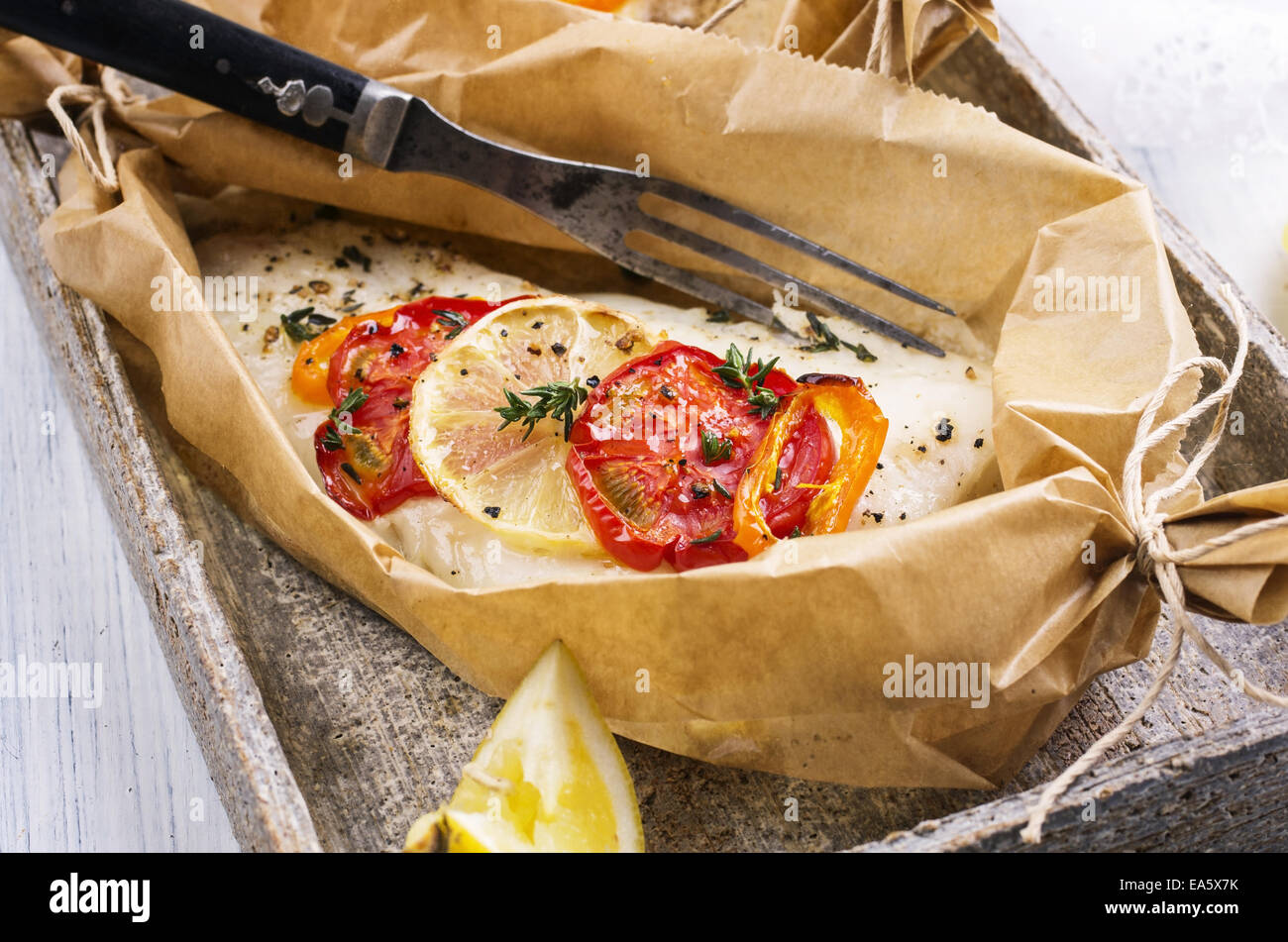 Baked fish hi-res stock photography and images - Alamy