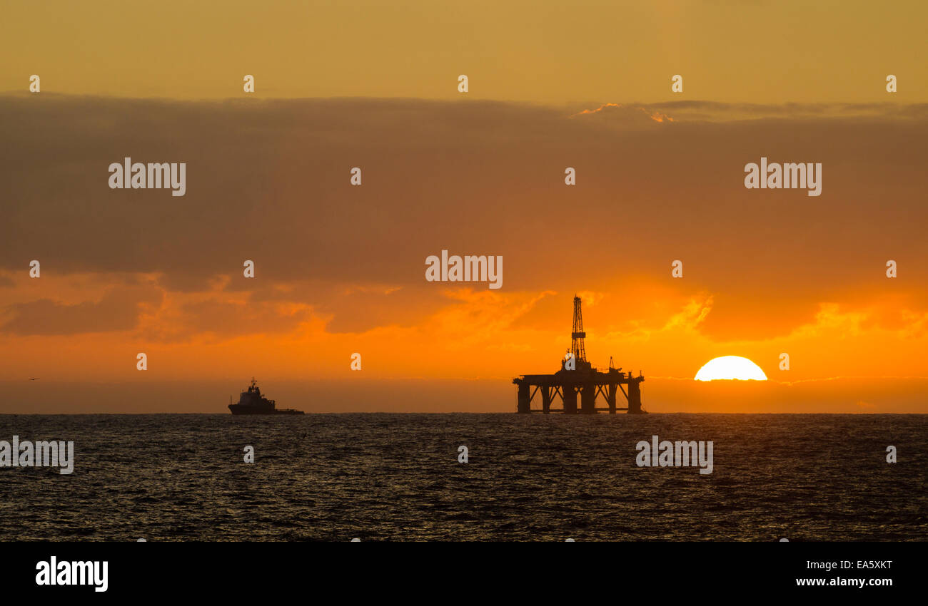 Offshore Oil rig at sunrise Stock Photo - Alamy