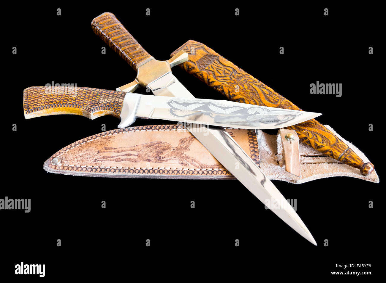 Cold weapon on black background Stock Photo - Alamy