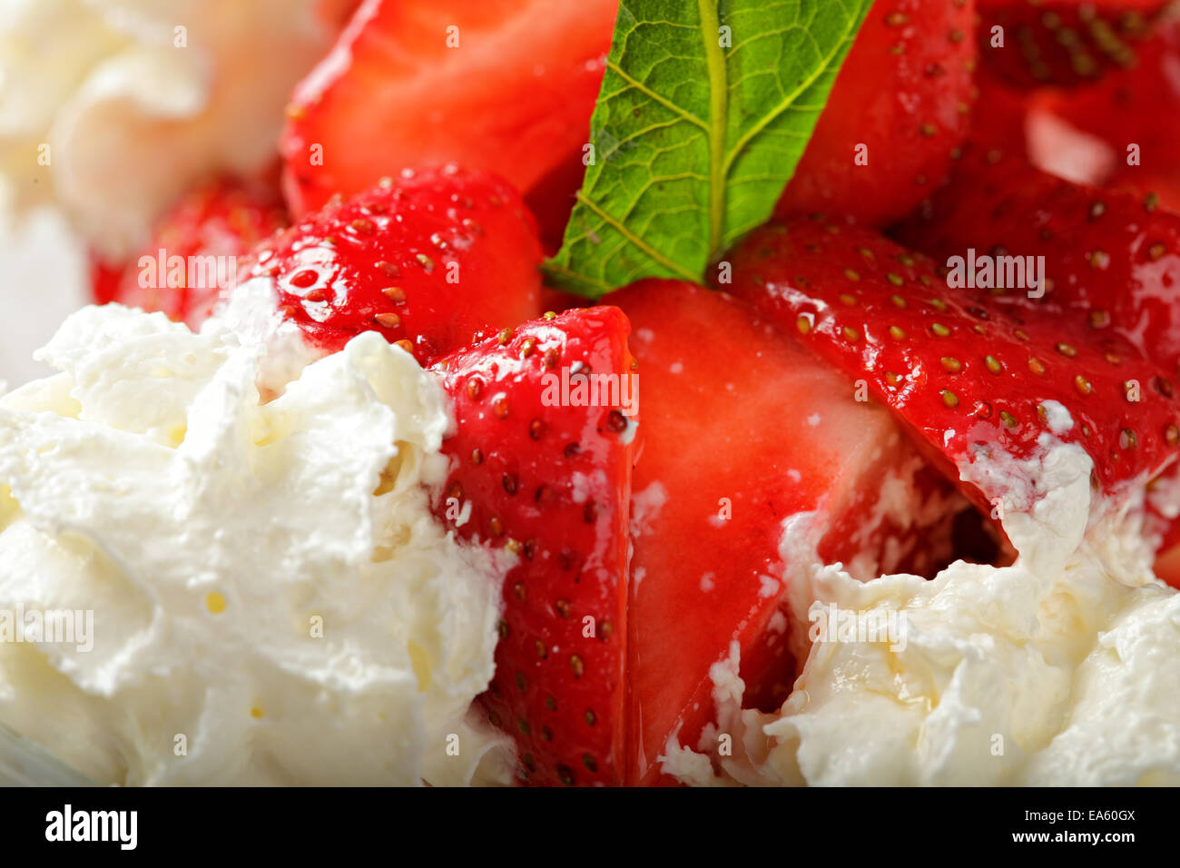 Strawberries and cream closeup Stock Photo - Alamy