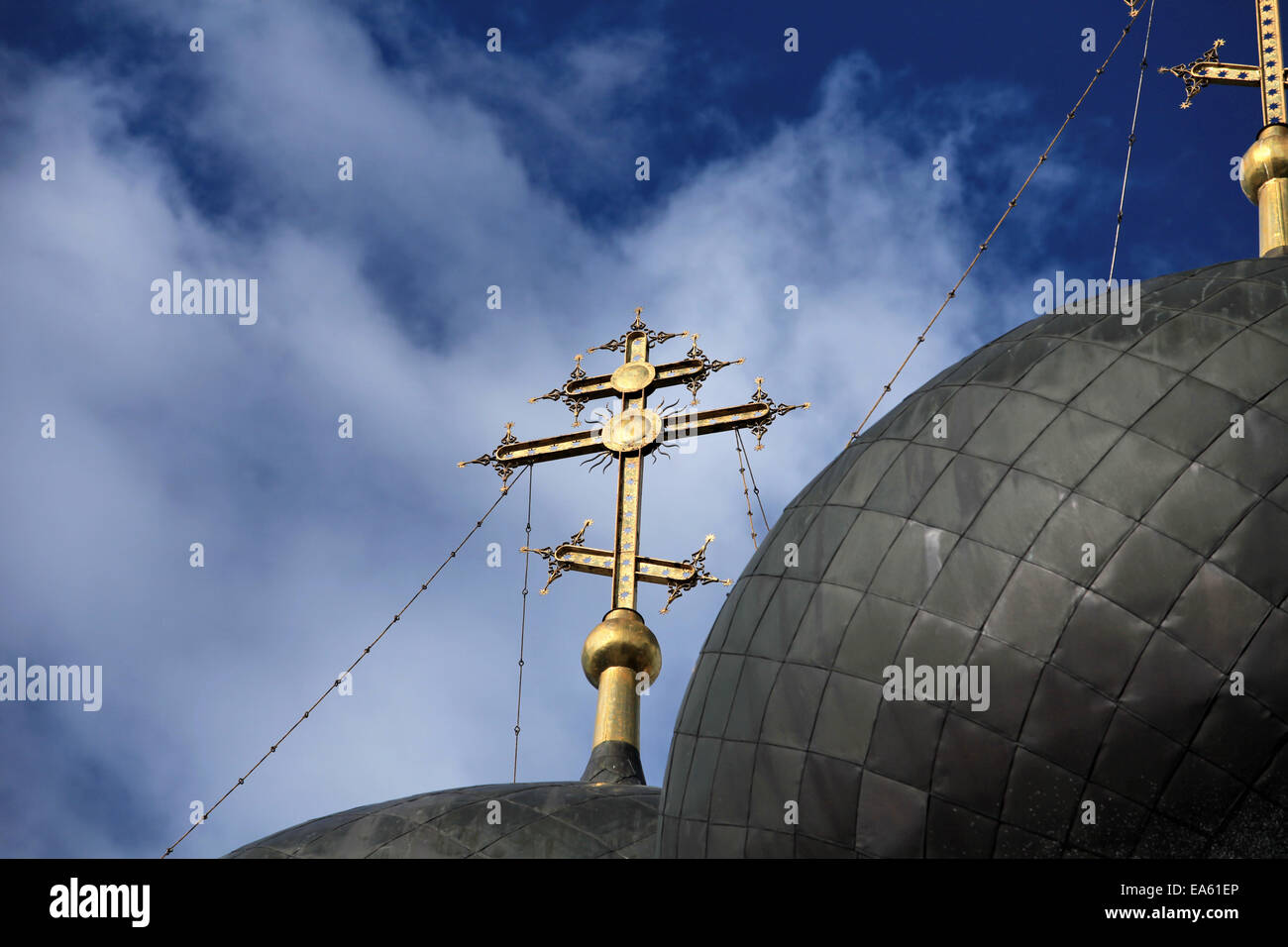 Golden cross on the church Stock Photo - Alamy
