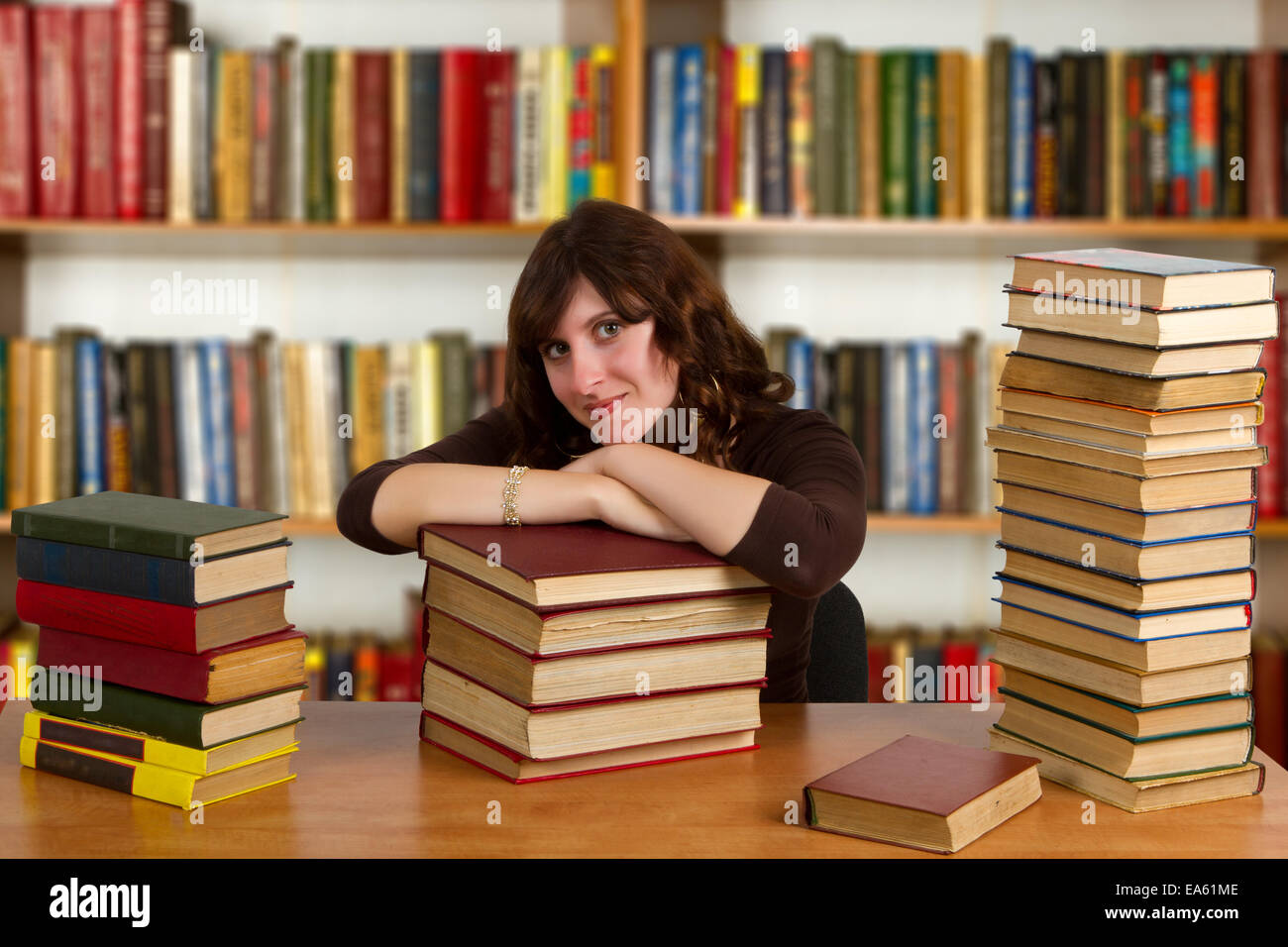 Teen students reading book desk hi-res stock photography and images - Alamy