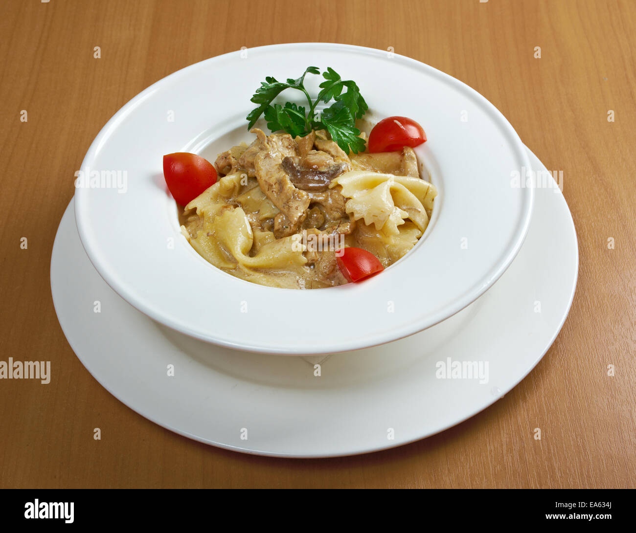 Farfalle pasta with vea Stock Photo - Alamy