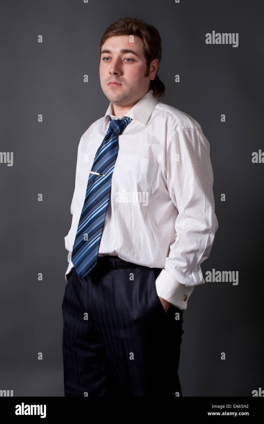 man posing in white shirt Stock Photo - Alamy