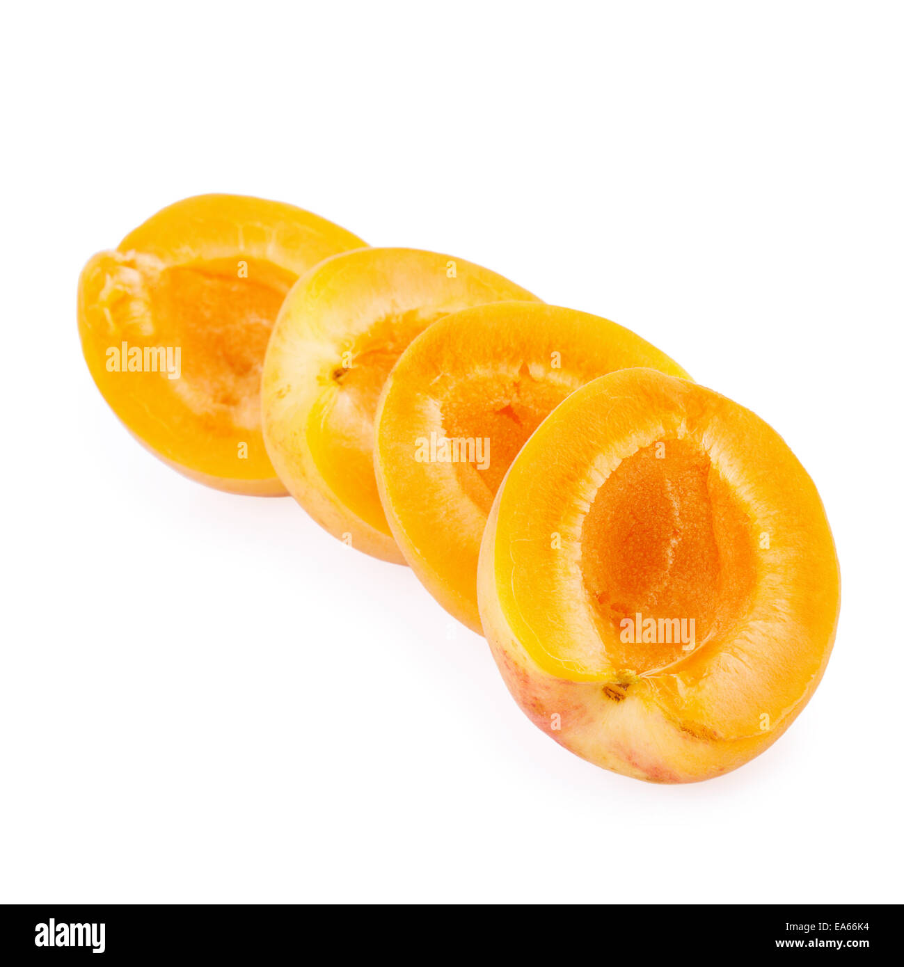 Apricots Halves isolated on white Stock Photo - Alamy