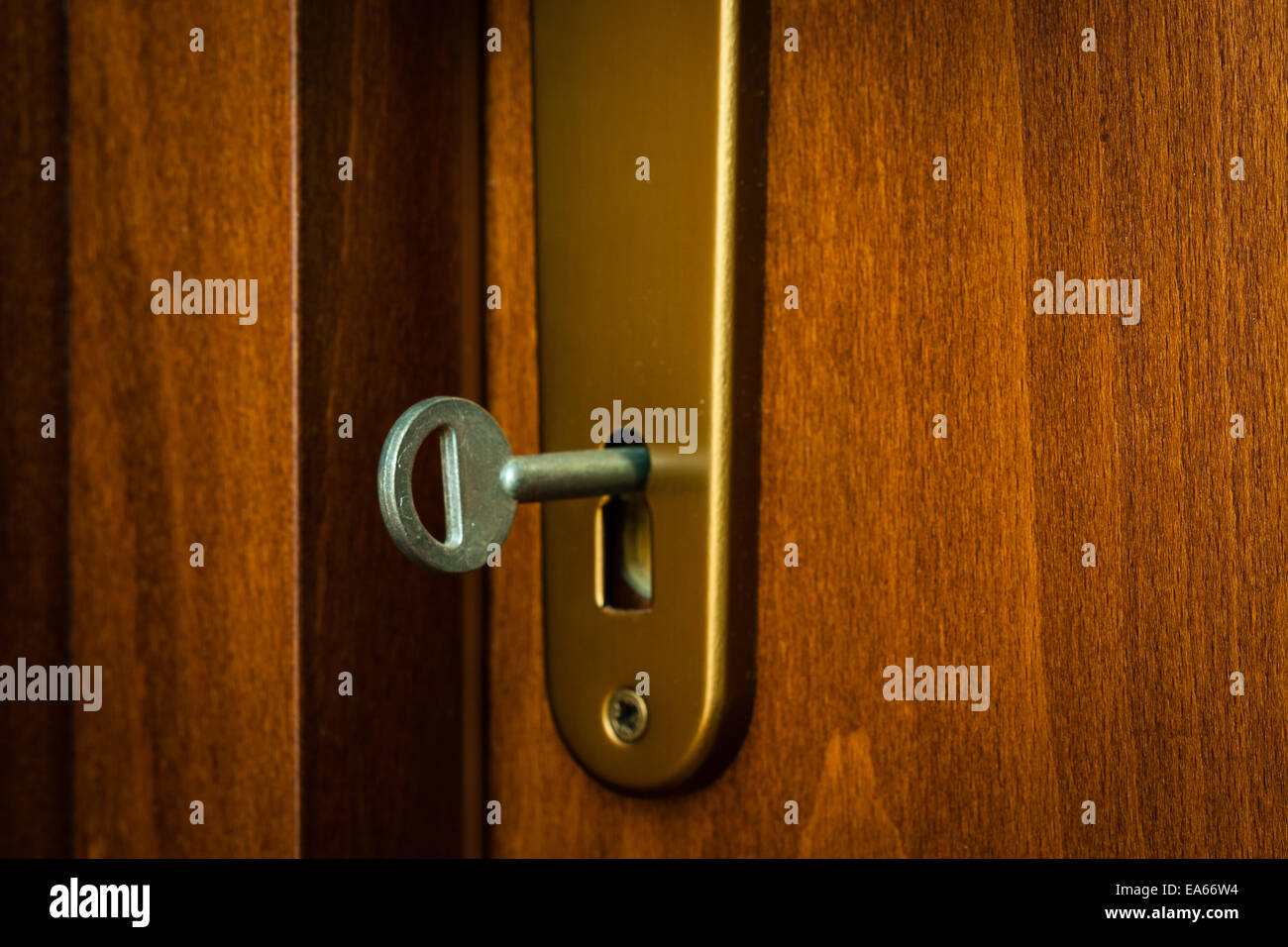 Wooden Door With Key In Keyhole High Resolution Stock Photography and ...