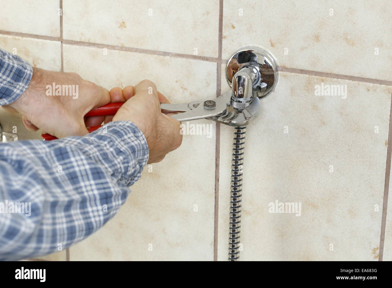 fixing a pipe Stock Photo - Alamy