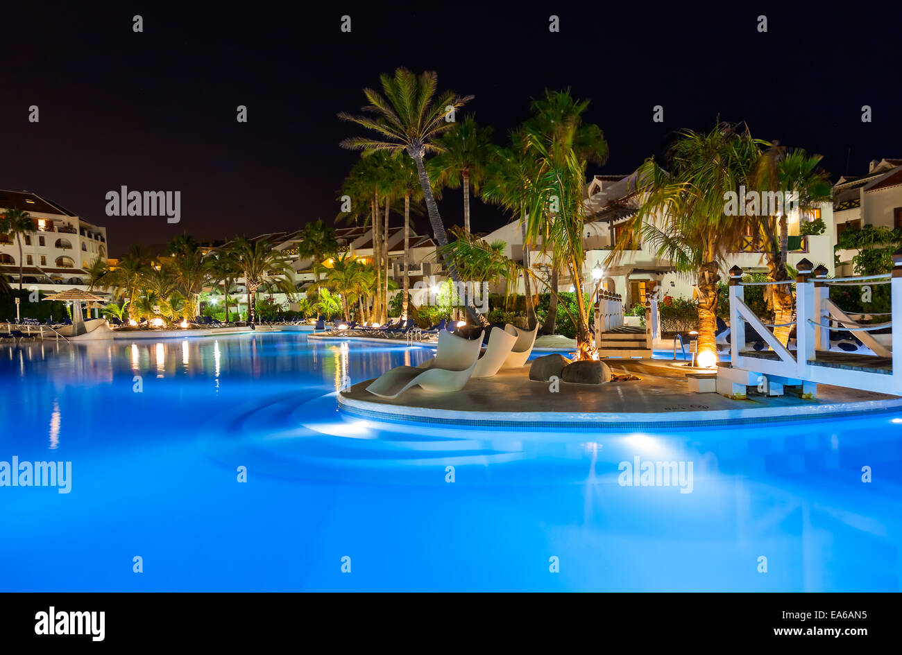 Swimming pool at night Stock Photo - Alamy