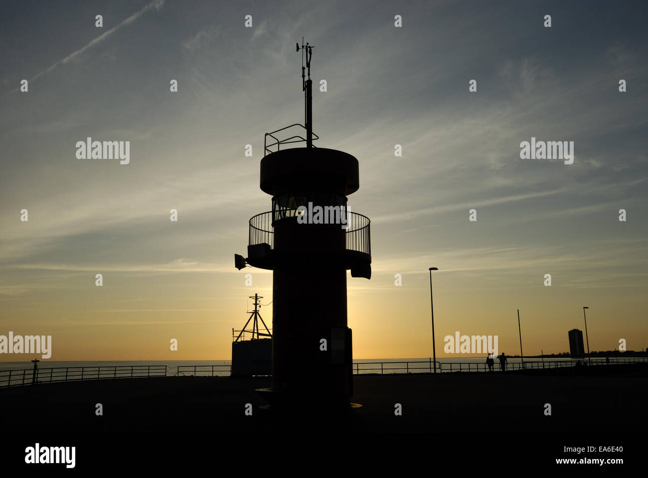 Sunset at the lighthouse in Buesum Stock Photo - Alamy