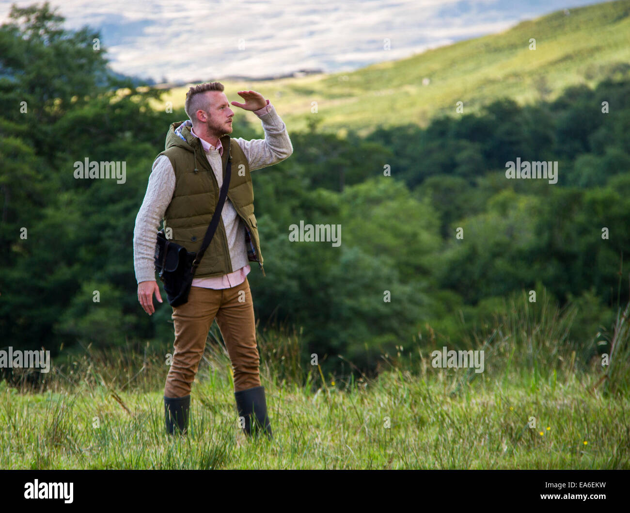 UK, Scotland, Man looking at view Stock Photo - Alamy