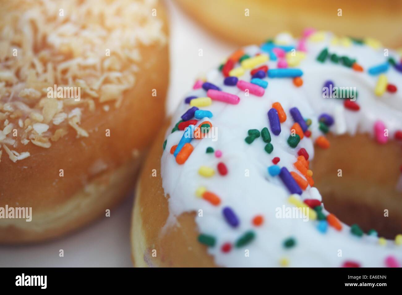 Close up of sprinkled donuts Stock Photo - Alamy