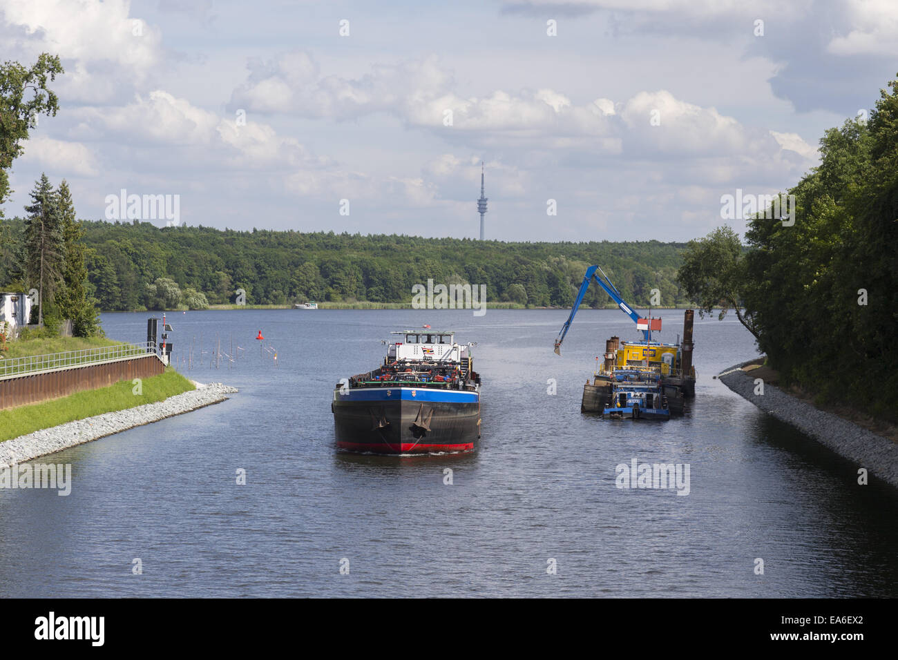 Cargo ship in canal Stock Photo - Alamy