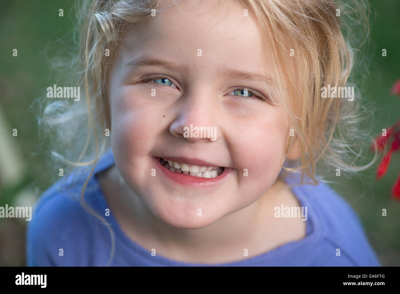 Portrait of a smiling girl Stock Photo - Alamy
