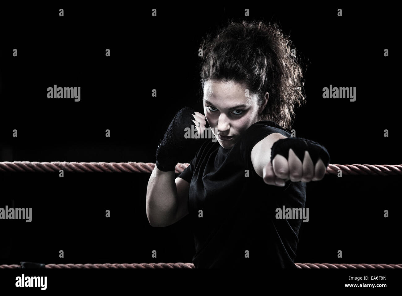 Portrait of a female boxer training in a boxing ring Stock Photo - Alamy