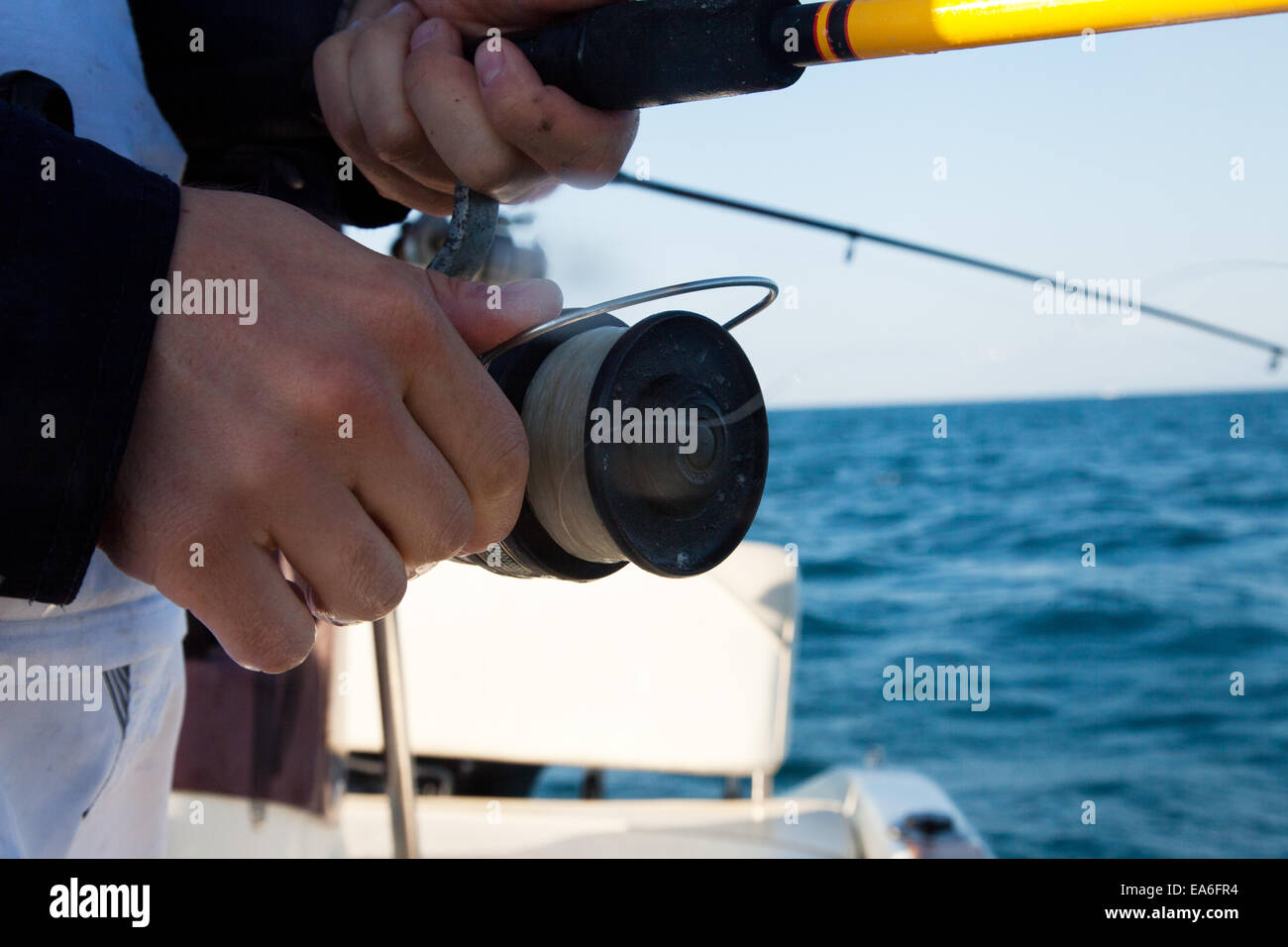 Italy, Puglia, TA, Ginosa, Marina di Ginosa, Close-up of Fishing rod ...