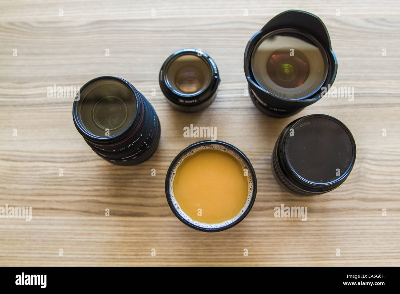 Filtered coffee in a lens body, surrounded by different lenses Stock ...