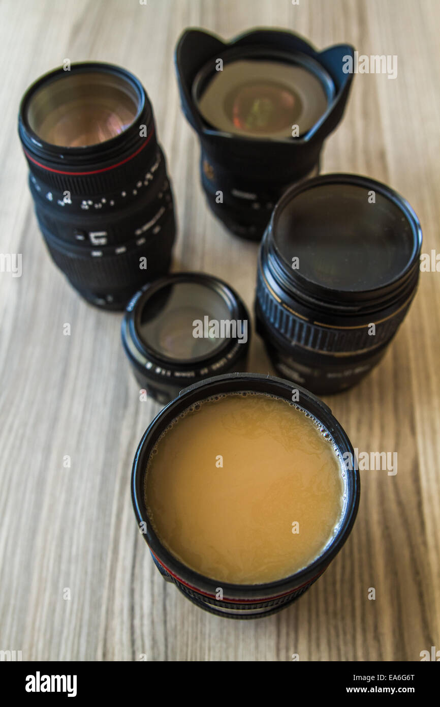 Filtered coffee in a lens body, surrounded by different lenses Stock ...