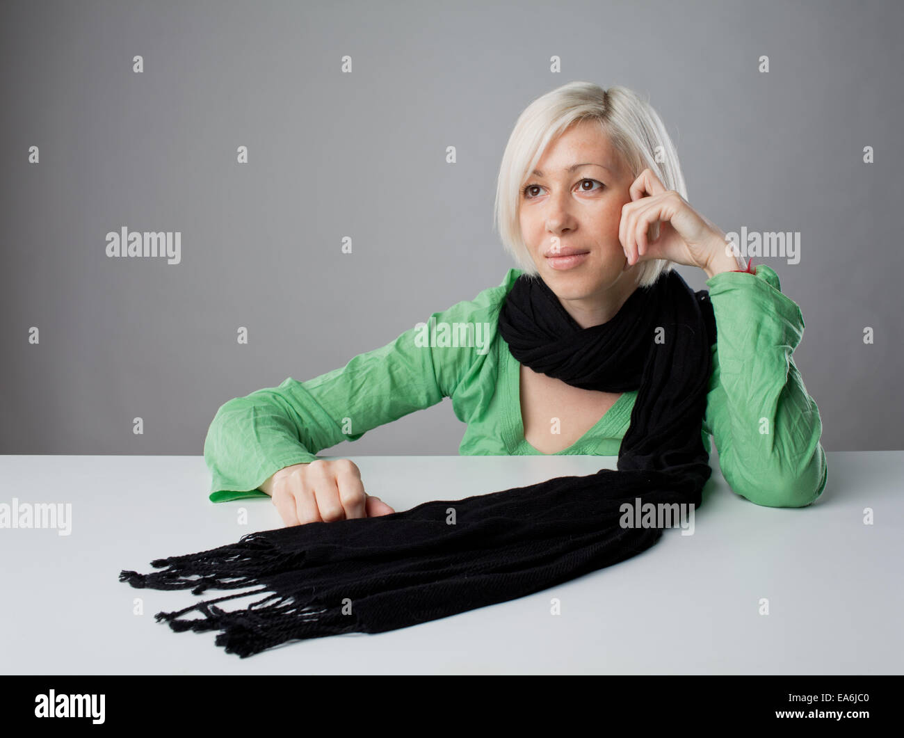woman at the table Stock Photo - Alamy
