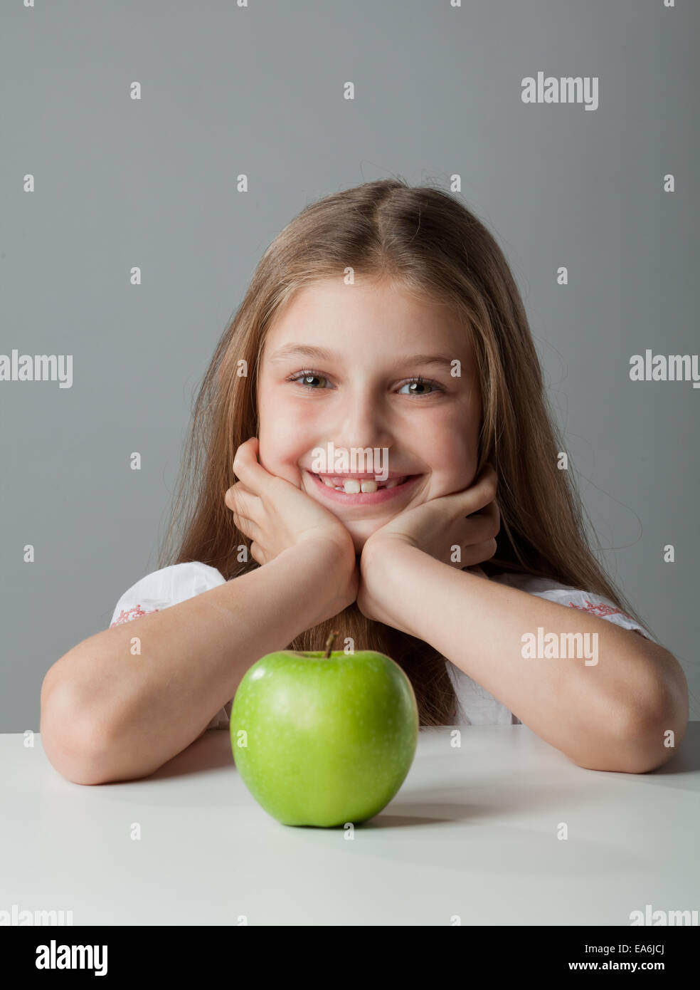 girl at the table Stock Photo - Alamy