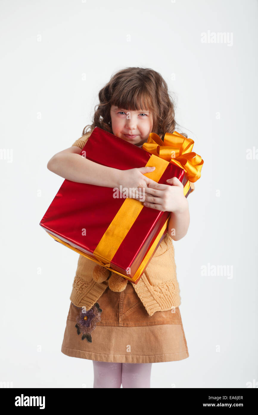 greedy girl with a gift Stock Photo - Alamy