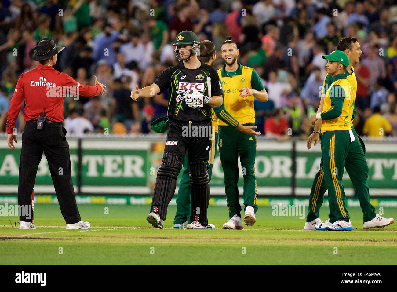 Melbourne, Victoria, Australia. 7th Nov, 2014. The umpire congratulates ...