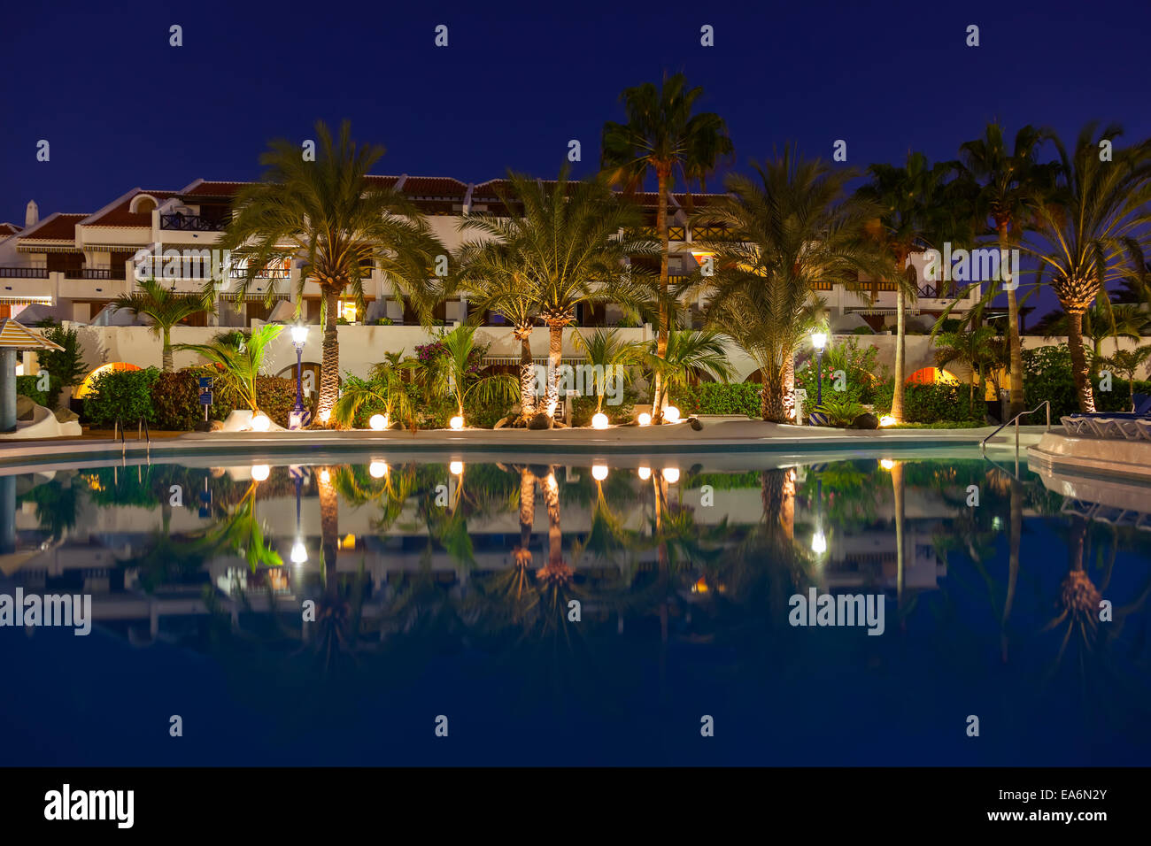 Swimming pool at night Stock Photo - Alamy
