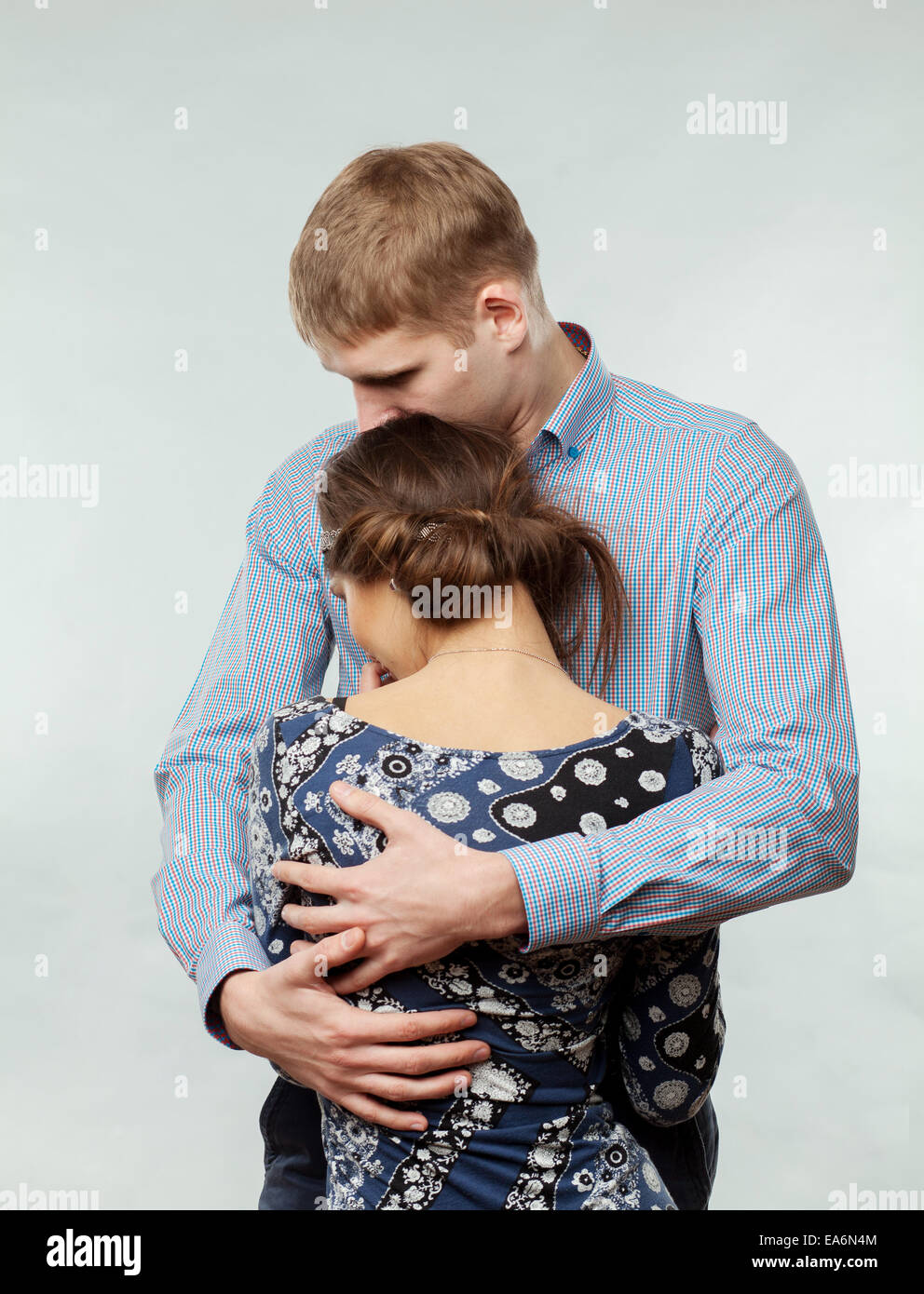 Guy Hugging Sad Girl