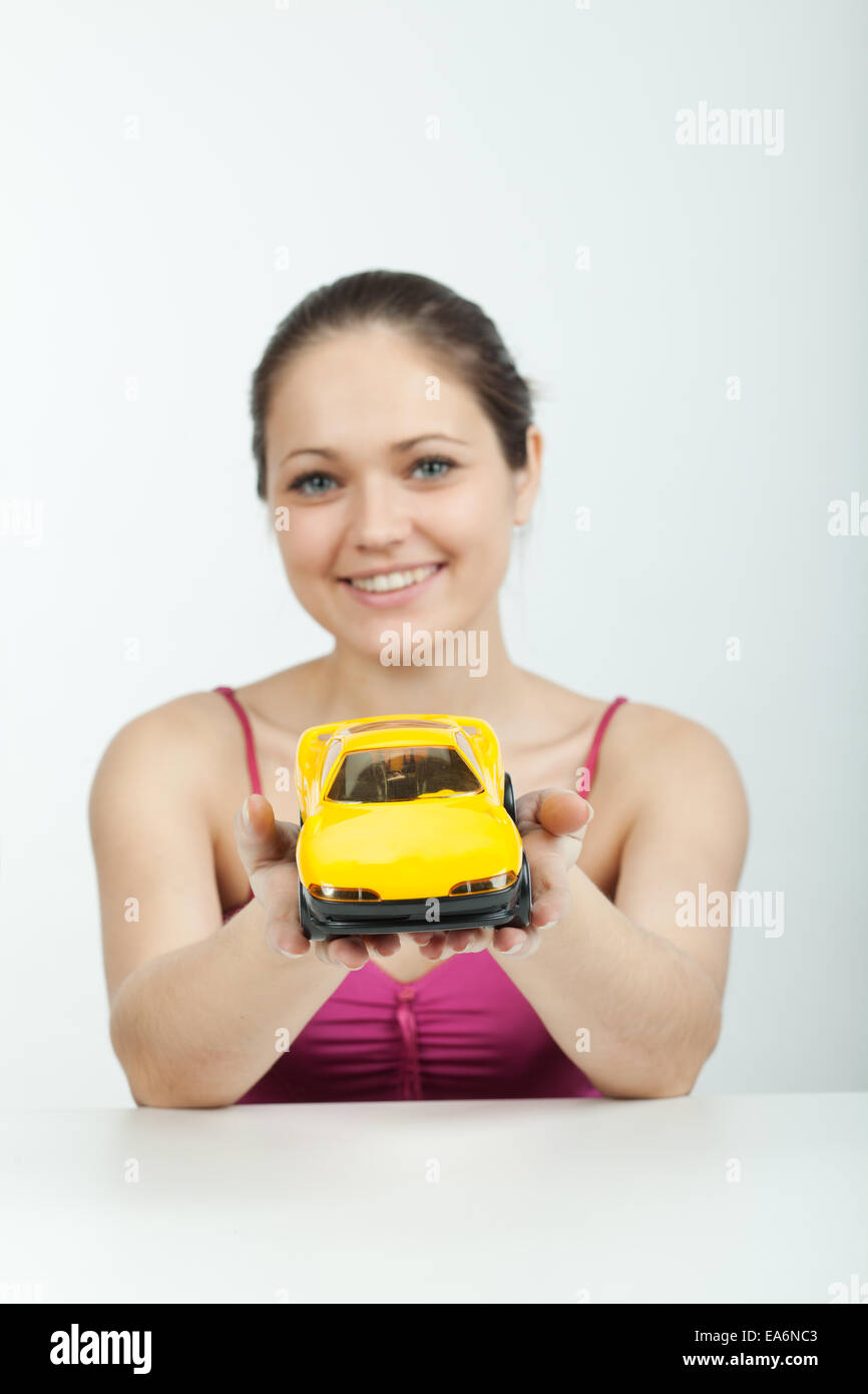 girl with a toy machine Stock Photo - Alamy