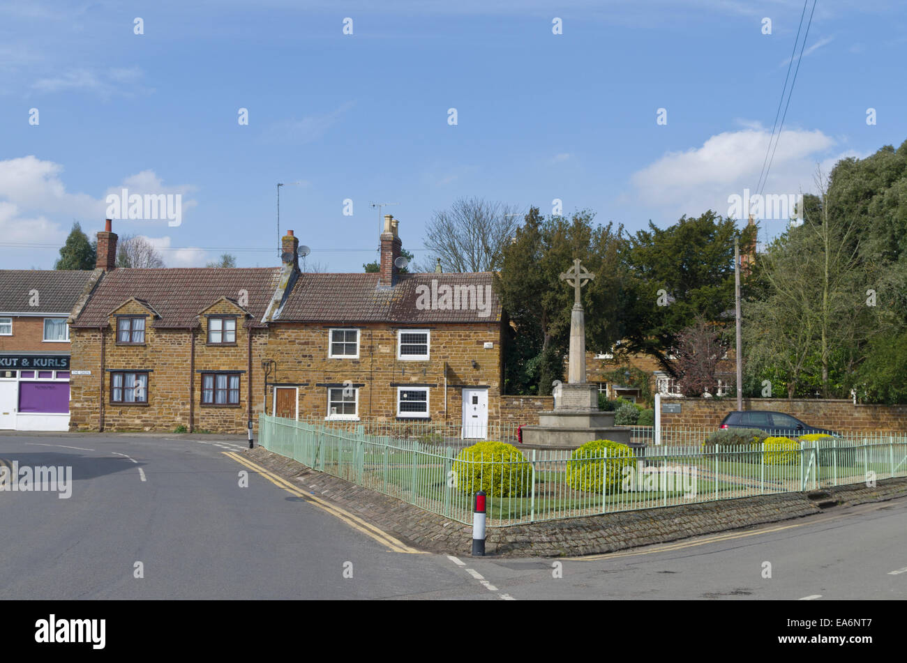 The small village green, with war memorial, in Hardingstone ...