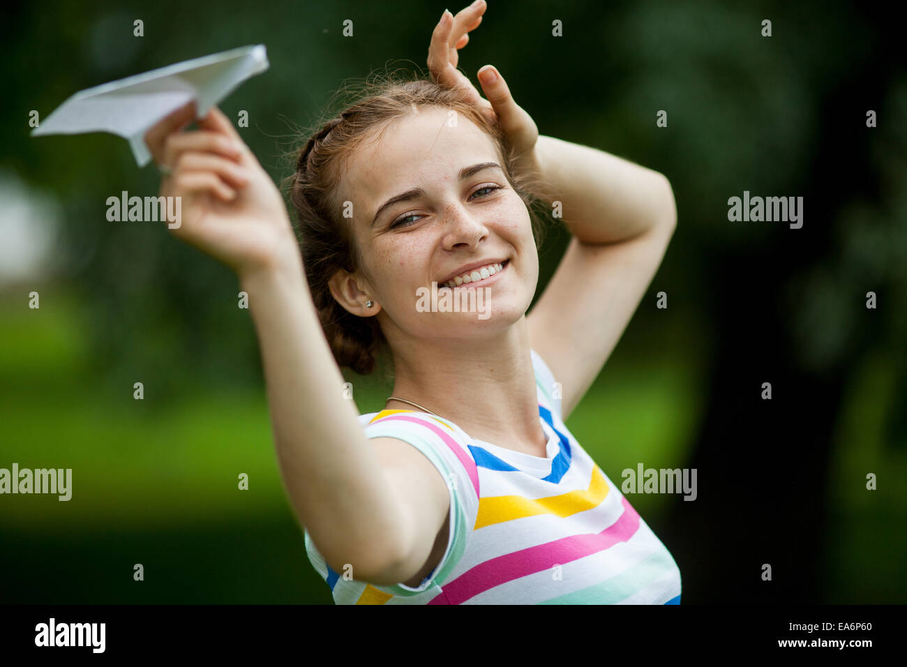 girls launch paper airplanes Stock Photo - Alamy