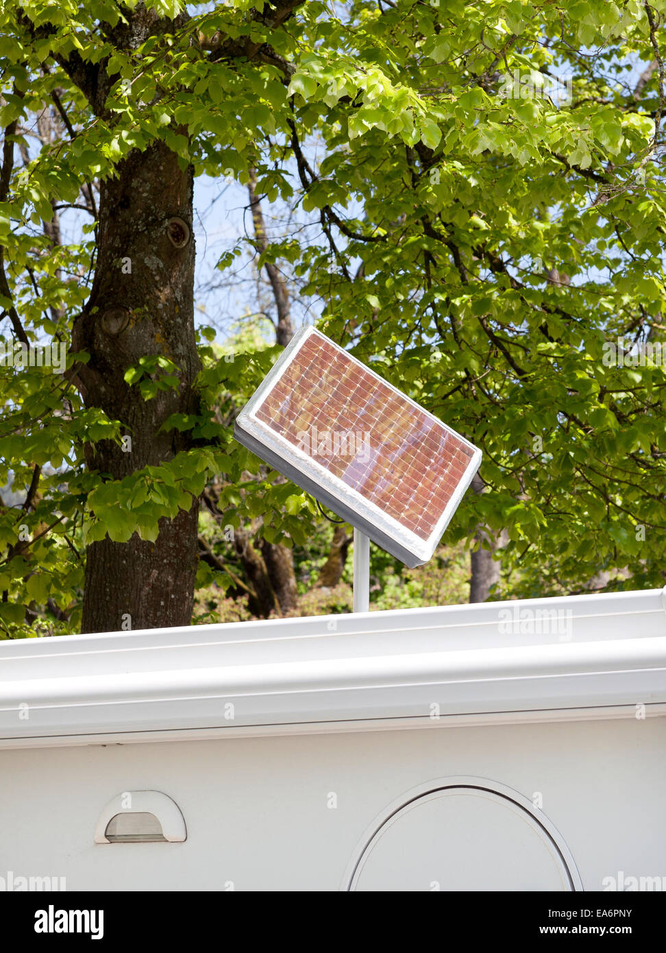 A rotating solar panel designed to follow the sun on a motor home ...