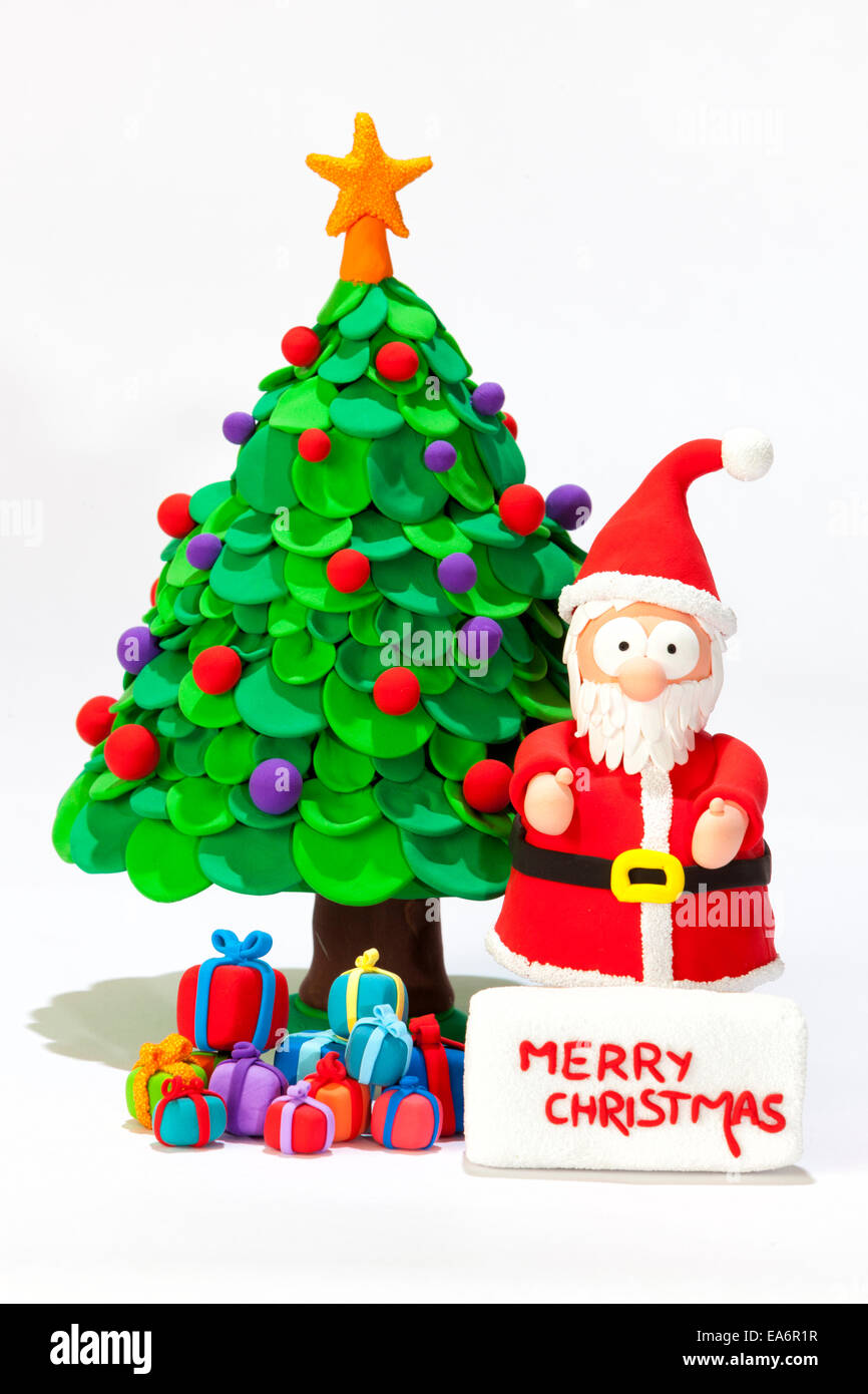 Santa Claus handmade with modeling clay wishing Merry Christmas with a ...