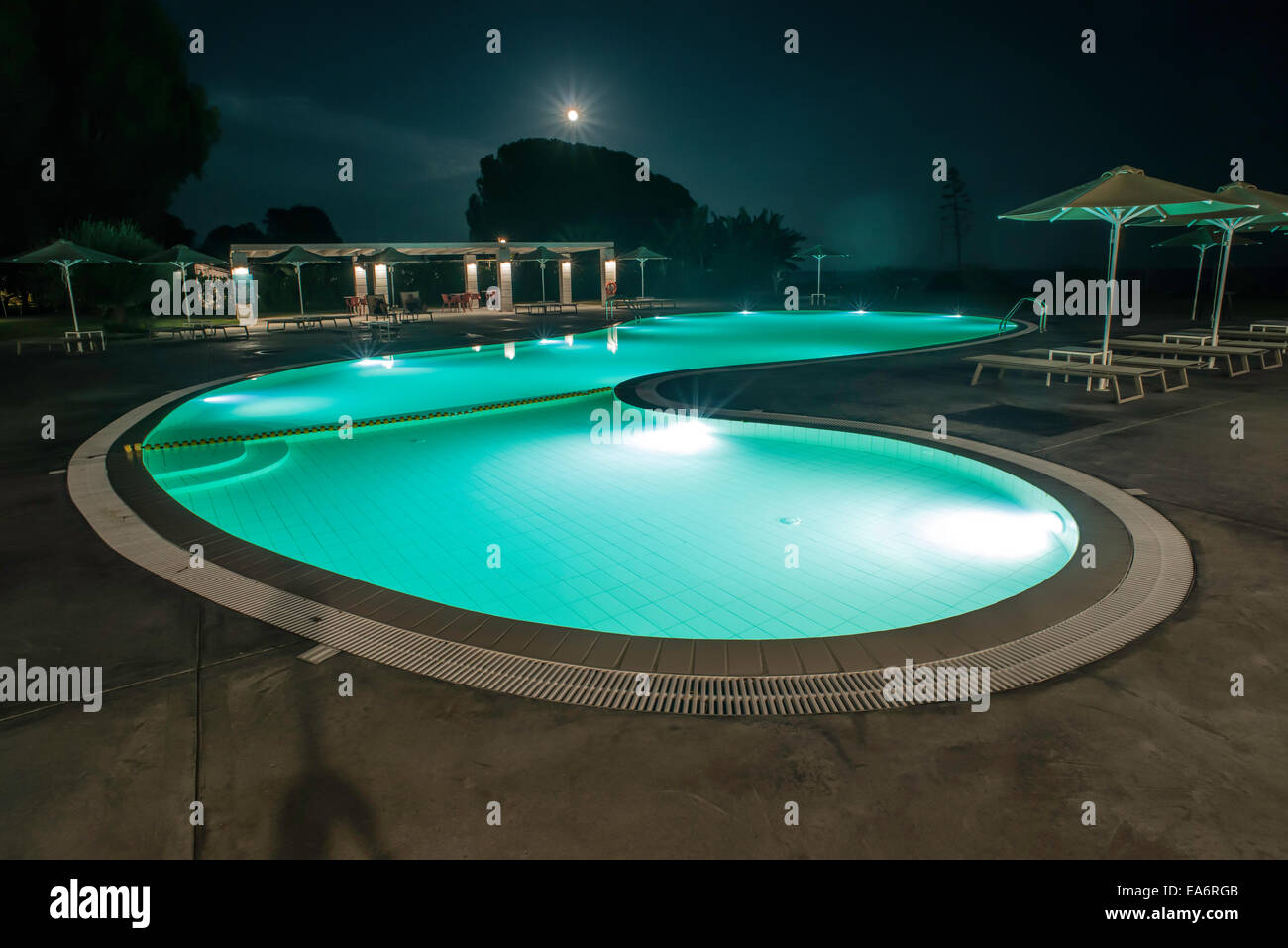 Blue swimming pool at night hi-res stock photography and images - Alamy