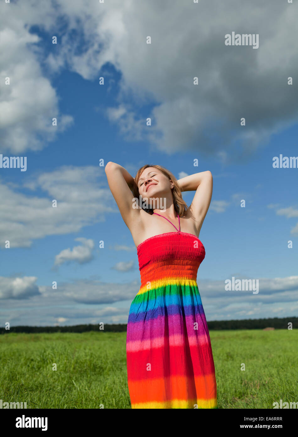 girl tilted her hands up and smiling Stock Photo - Alamy