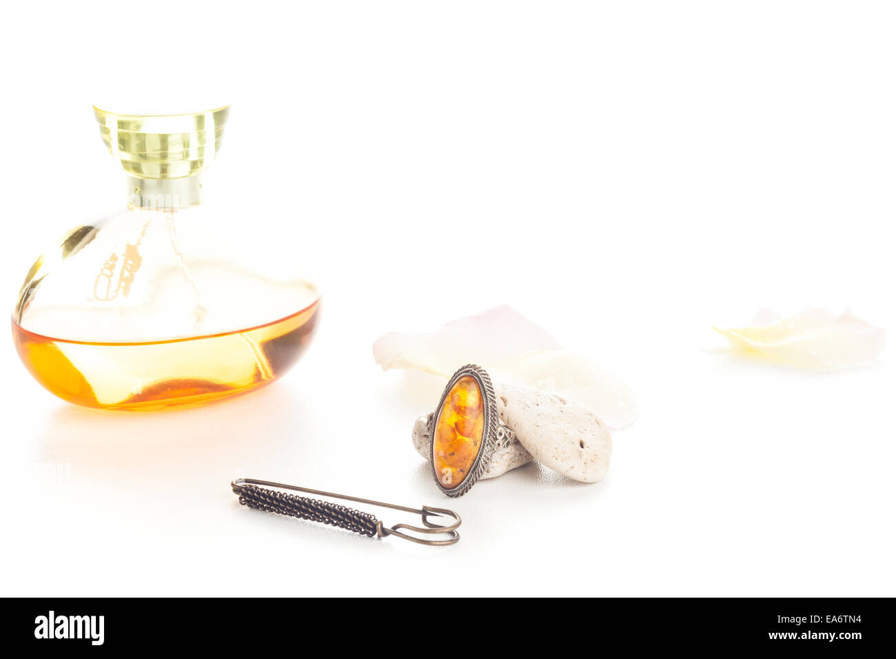 perfume and ring Stock Photo - Alamy