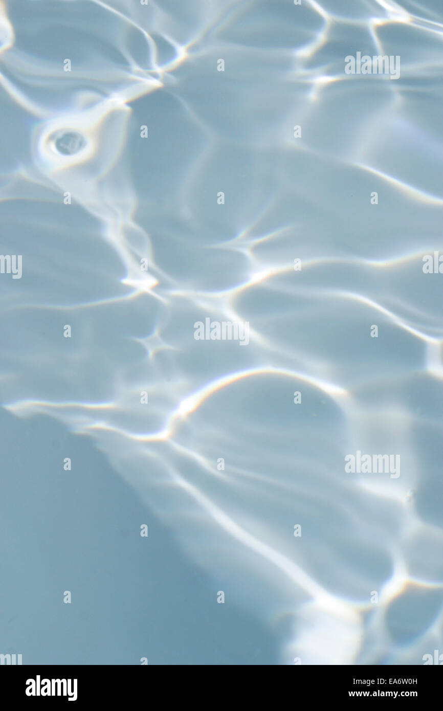 Sunlight shining in a swimming pool showing water reflection Stock ...